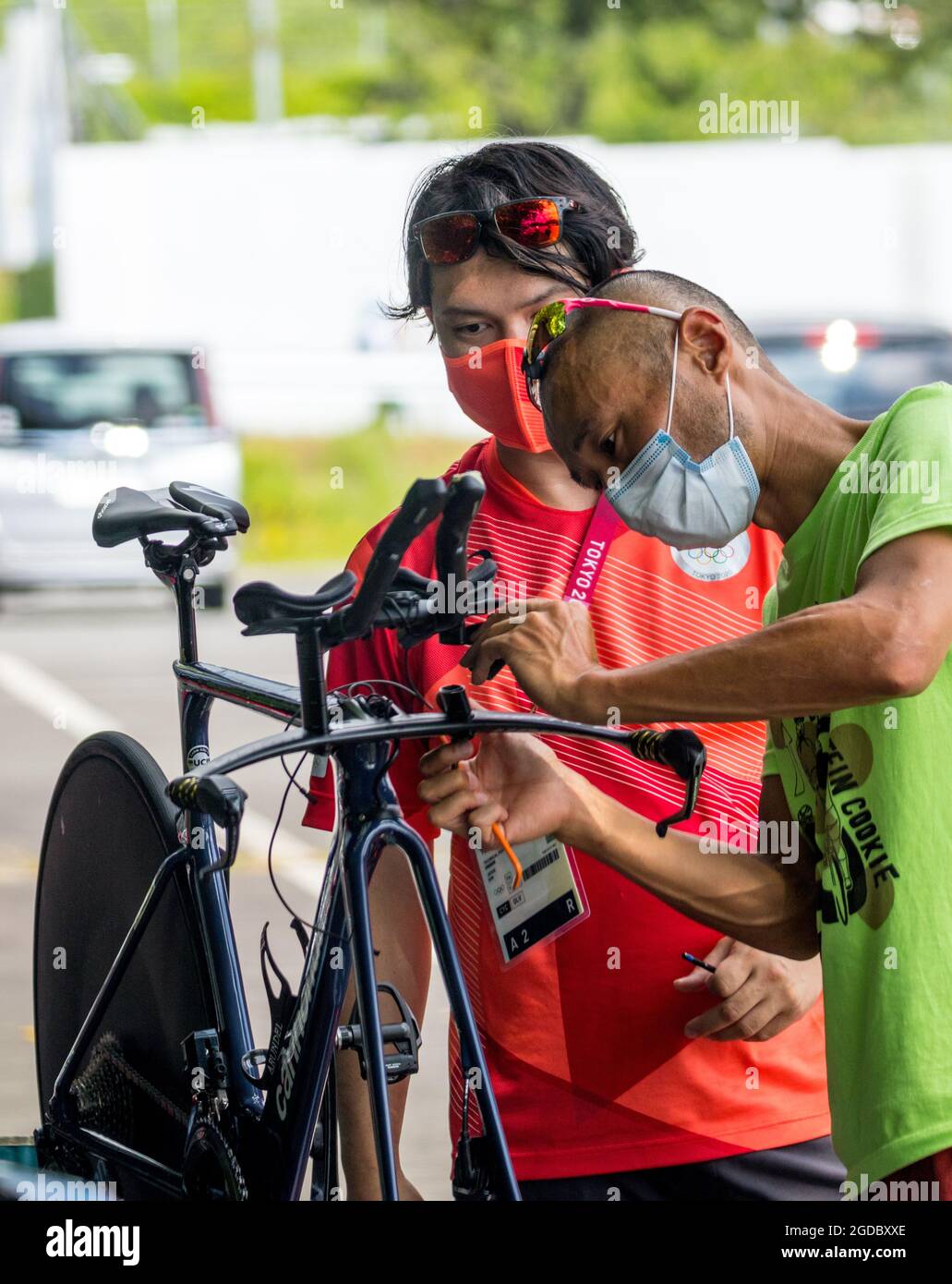Eri Yonamine's team prepare her bike for the Japanese cycle champion ...