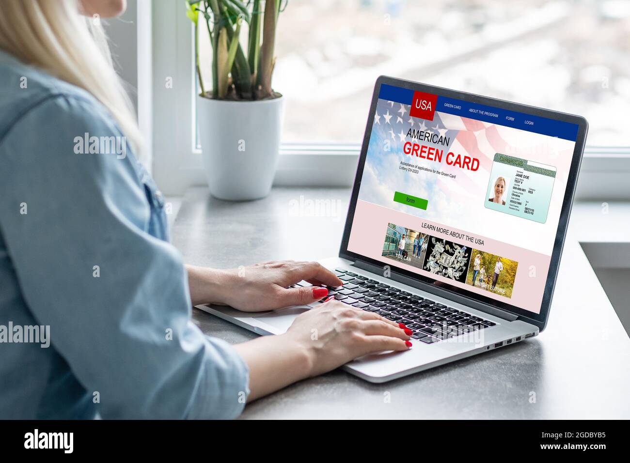 woman with laptop United States Permanent Resident Card Stock Photo - Alamy