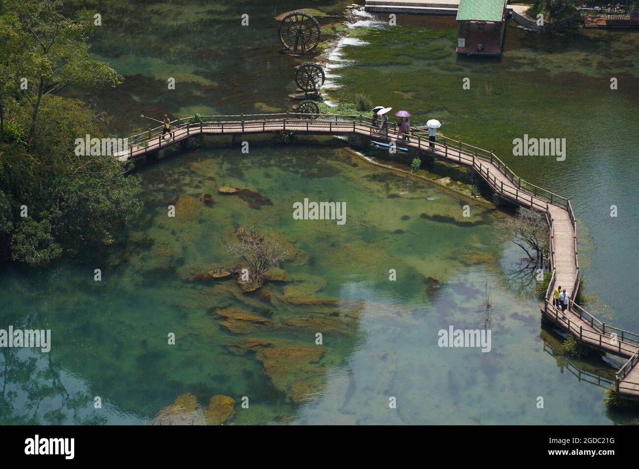 Aerial view of Equan Village against the sunset in Jingxi city, south ...