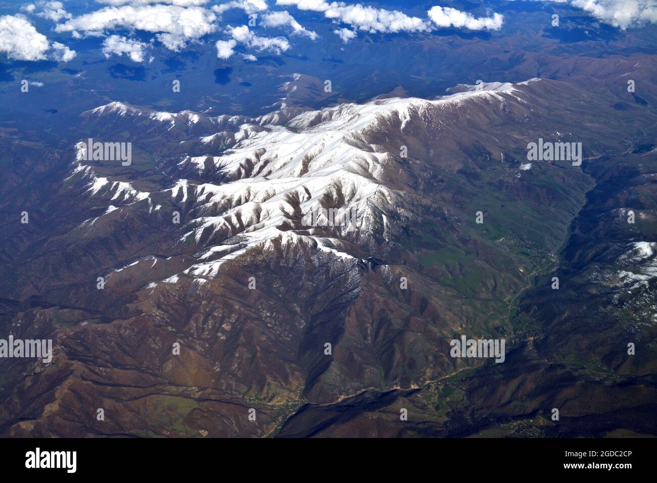 Top view of mountain peaks in the snow Stock Photo - Alamy