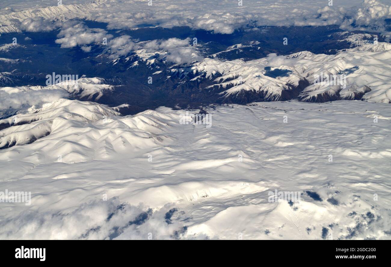 Top view of mountain peaks in the snow Stock Photo - Alamy