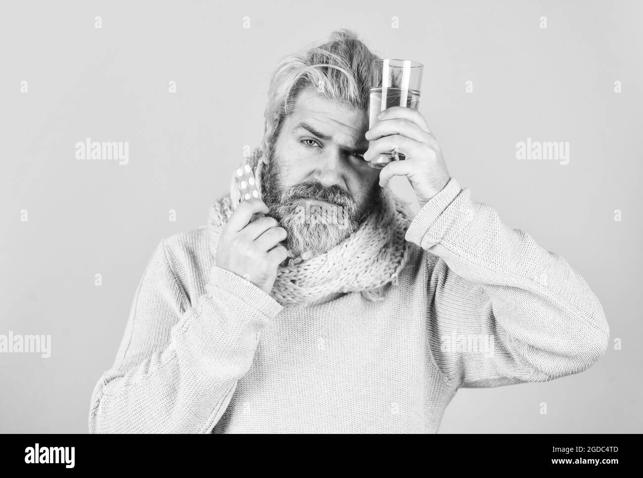 coronavirus from china. Medication you need. Unhealthy man hold pills ...