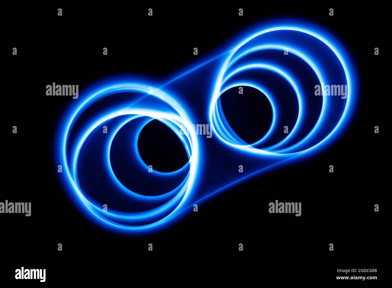 Sound waves in the visible blue color in the dark Stock Photo - Alamy