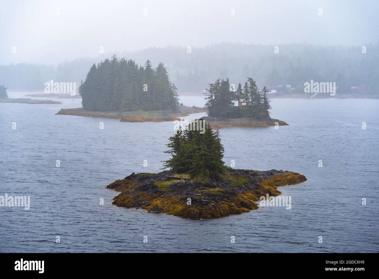 Small islands near Ketchikan Alaska on rainy day Stock Photo - Alamy