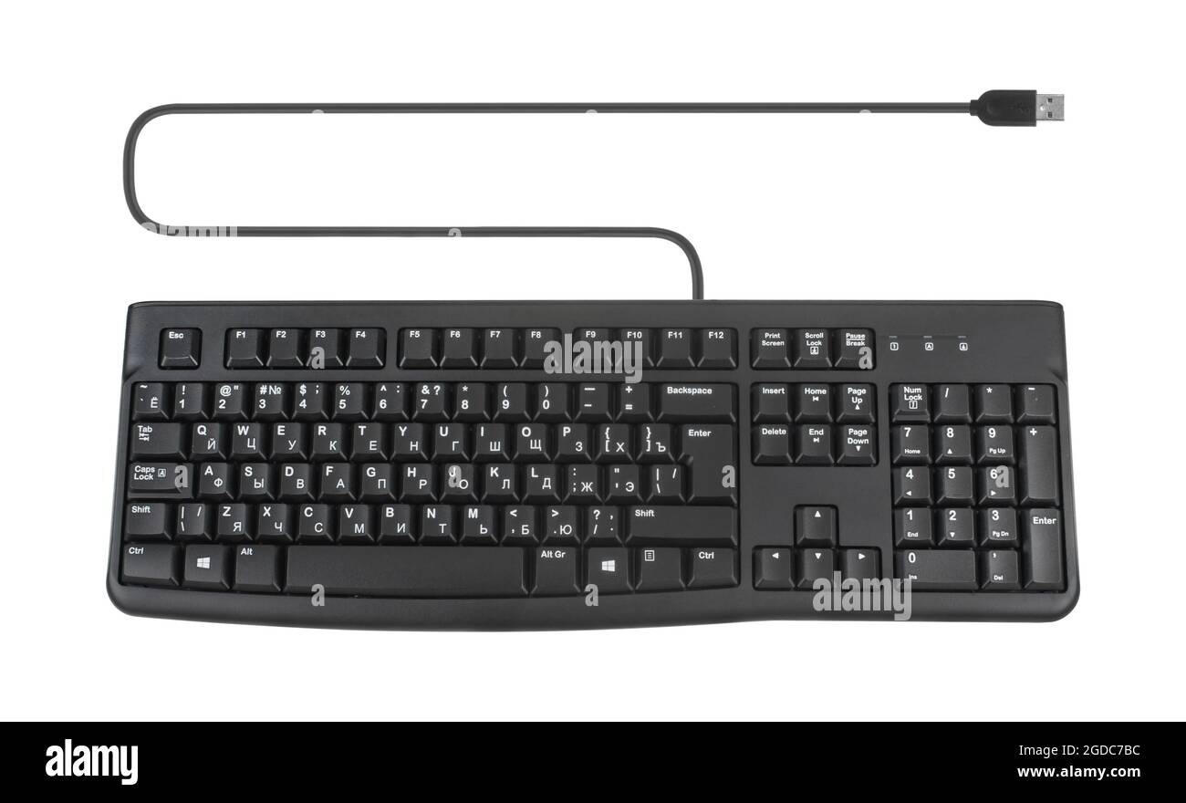 keyboard for a computer, wired with a wire and a connection plug, on a ...