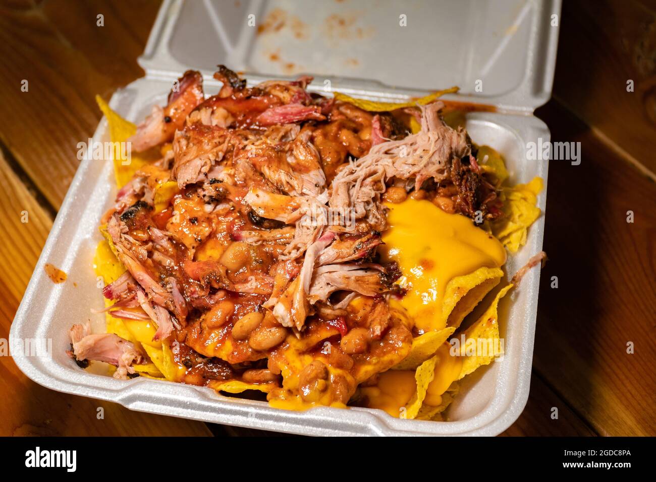 Cheesy BBQ Pulled Pork Nachos Stock Photo - Alamy
