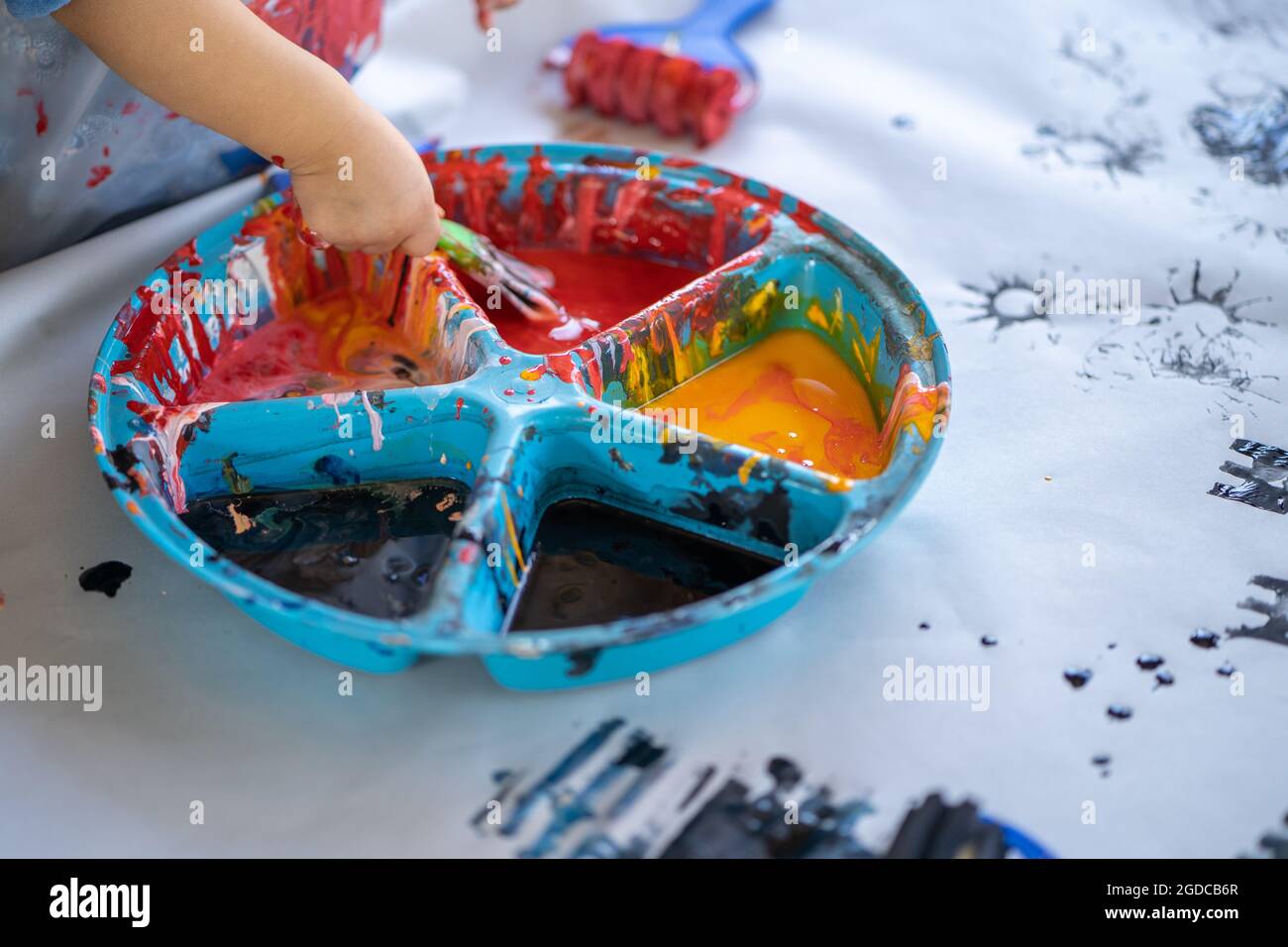Closeup shot of a messy painting table at a preschool Stock Photo - Alamy