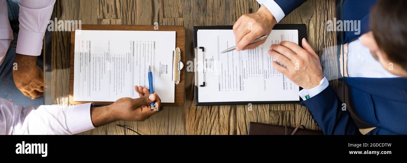 Human Human Shot Above Desk With CV Stock Photo - Alamy