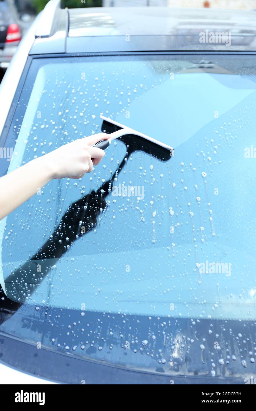 Hand washing car window Stock Photo - Alamy
