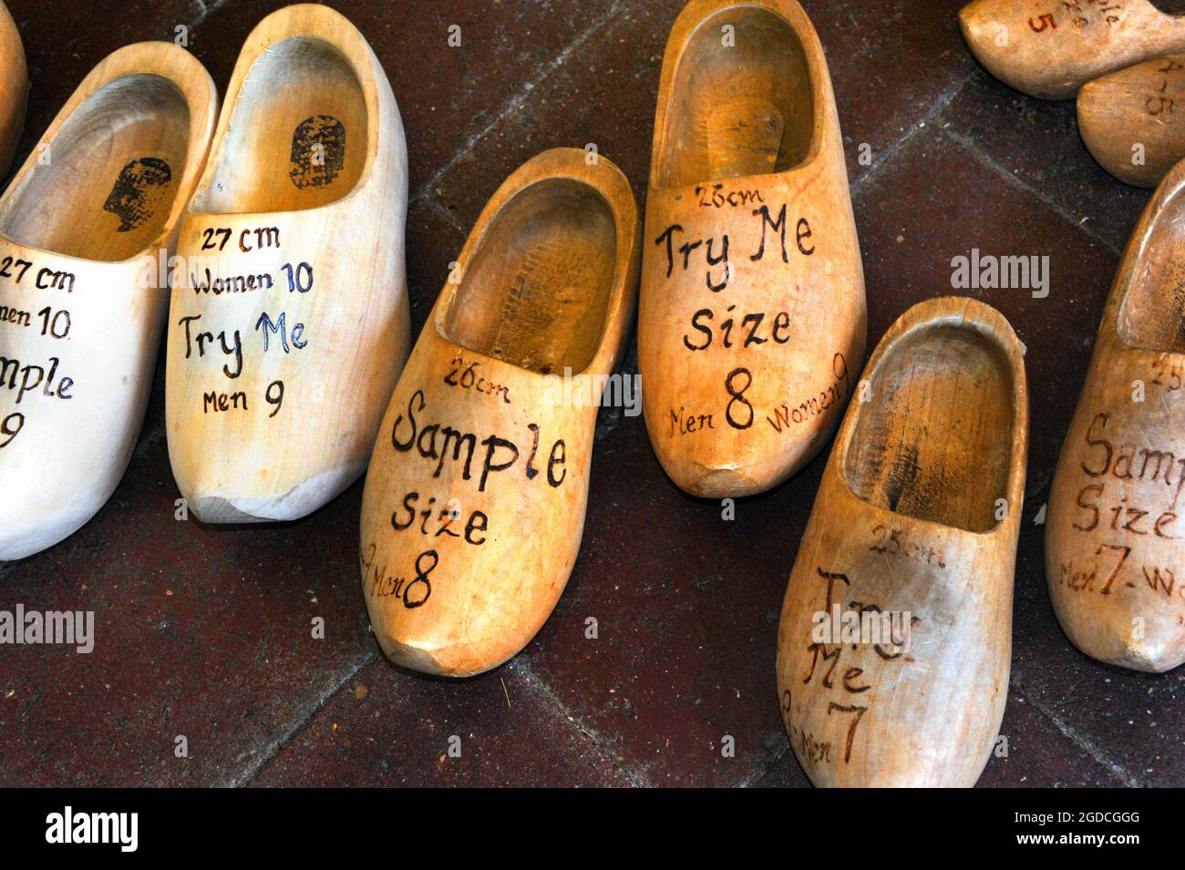 Assorted Dutch shoes are sitting ready for customers to try on. They ...