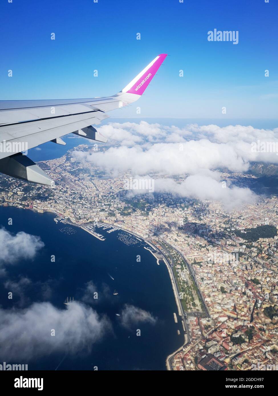 Naples, Italy - August 27 2020: Aeroplane window view to clouds over ...