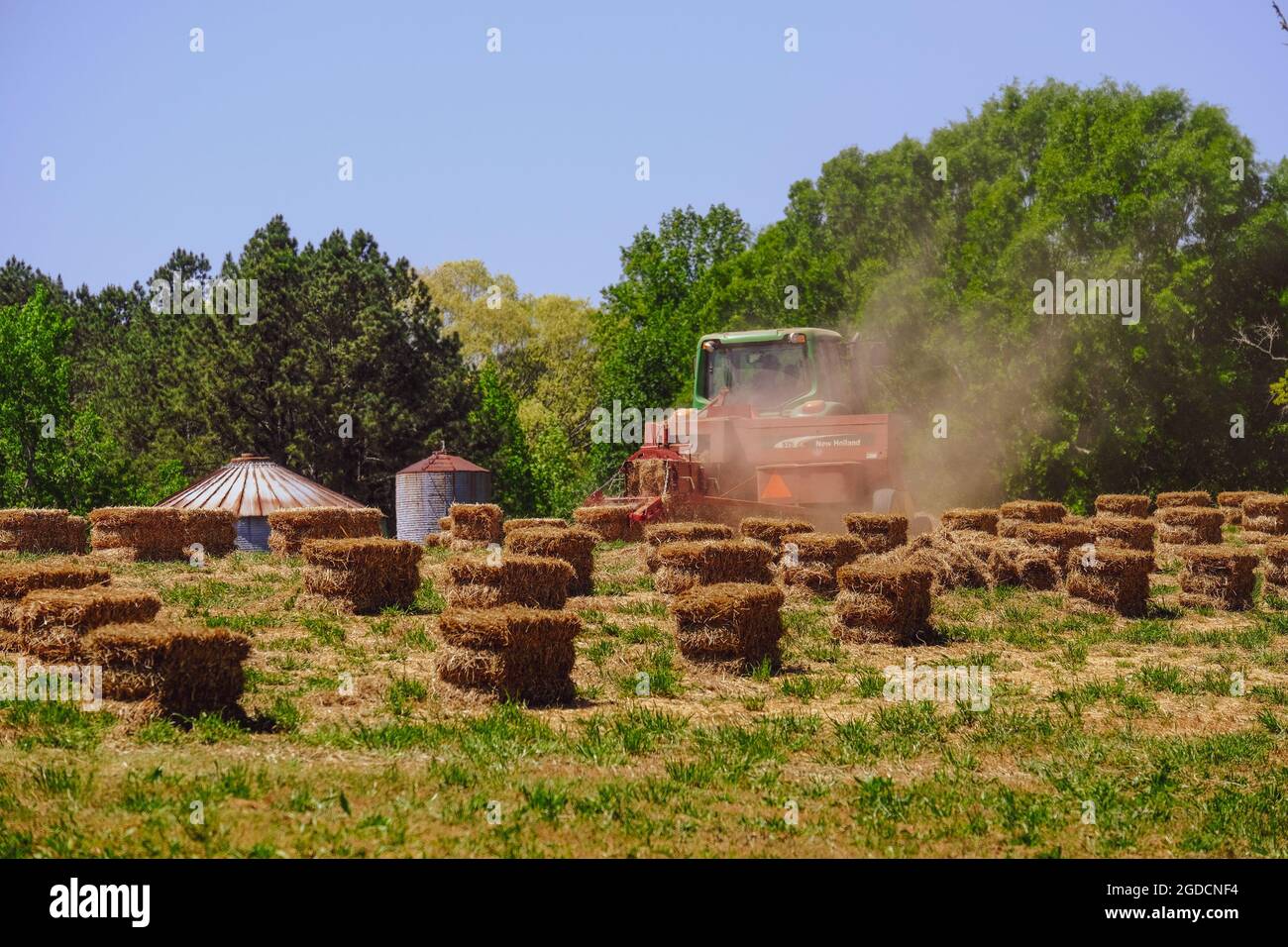 Farm Machinery Harvesting Hay Stock Photo - Alamy