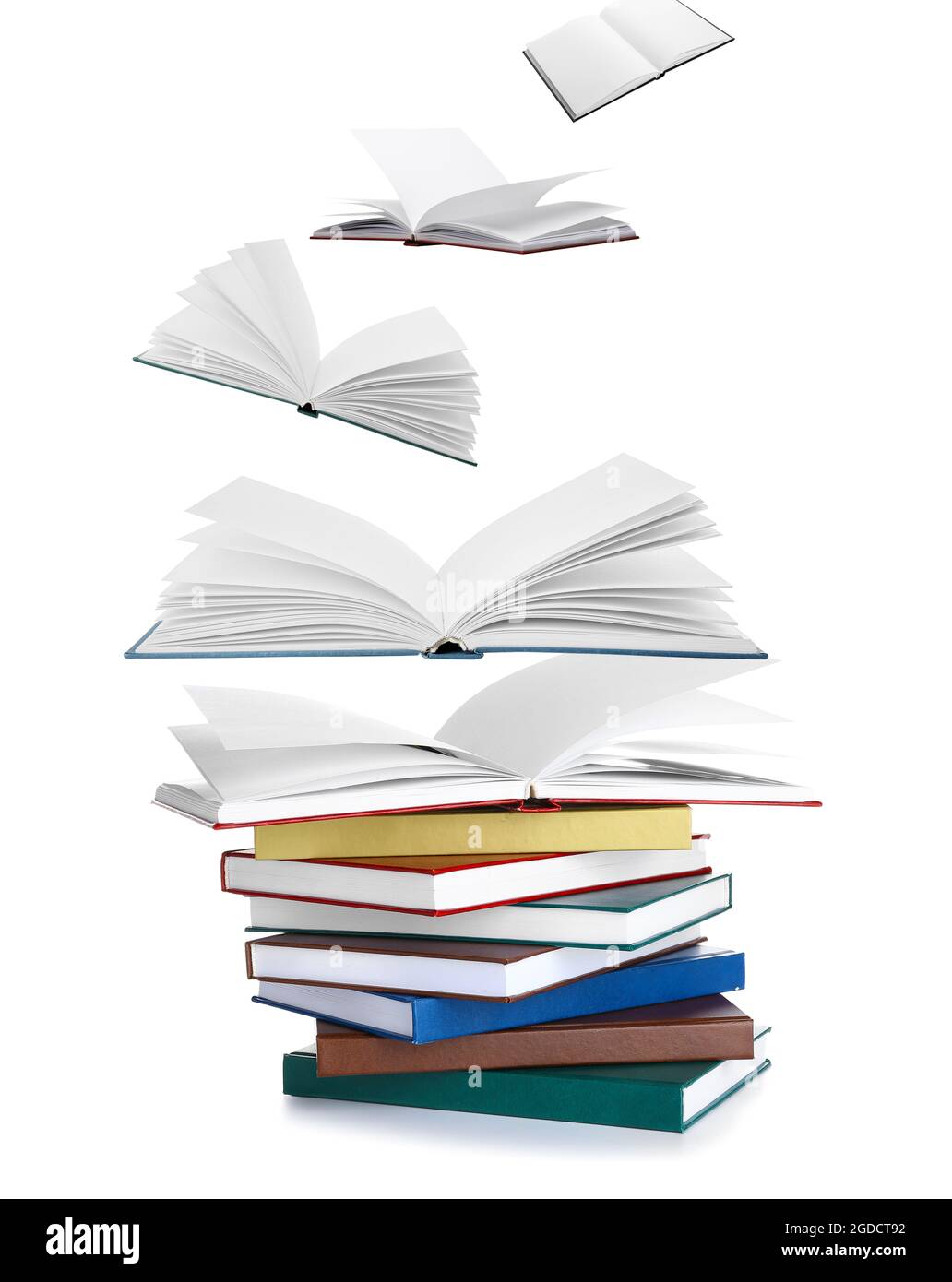 Flying books on white background Stock Photo - Alamy
