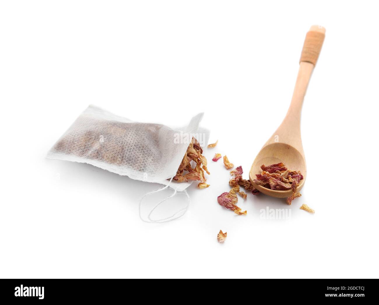 Tea bags and spoon with dry leaves on white background Stock Photo - Alamy