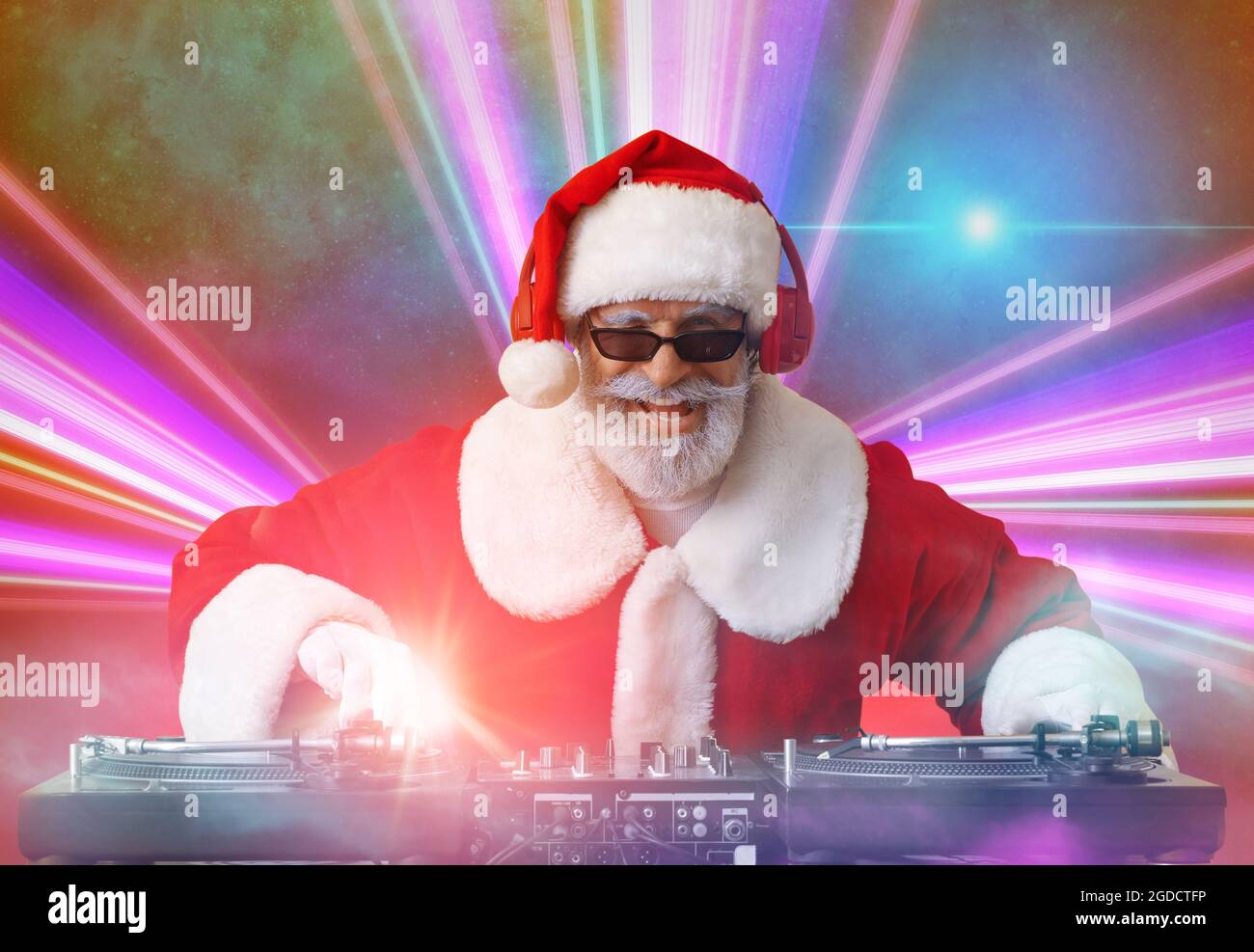 Cool Santa DJ playing music in club Stock Photo - Alamy