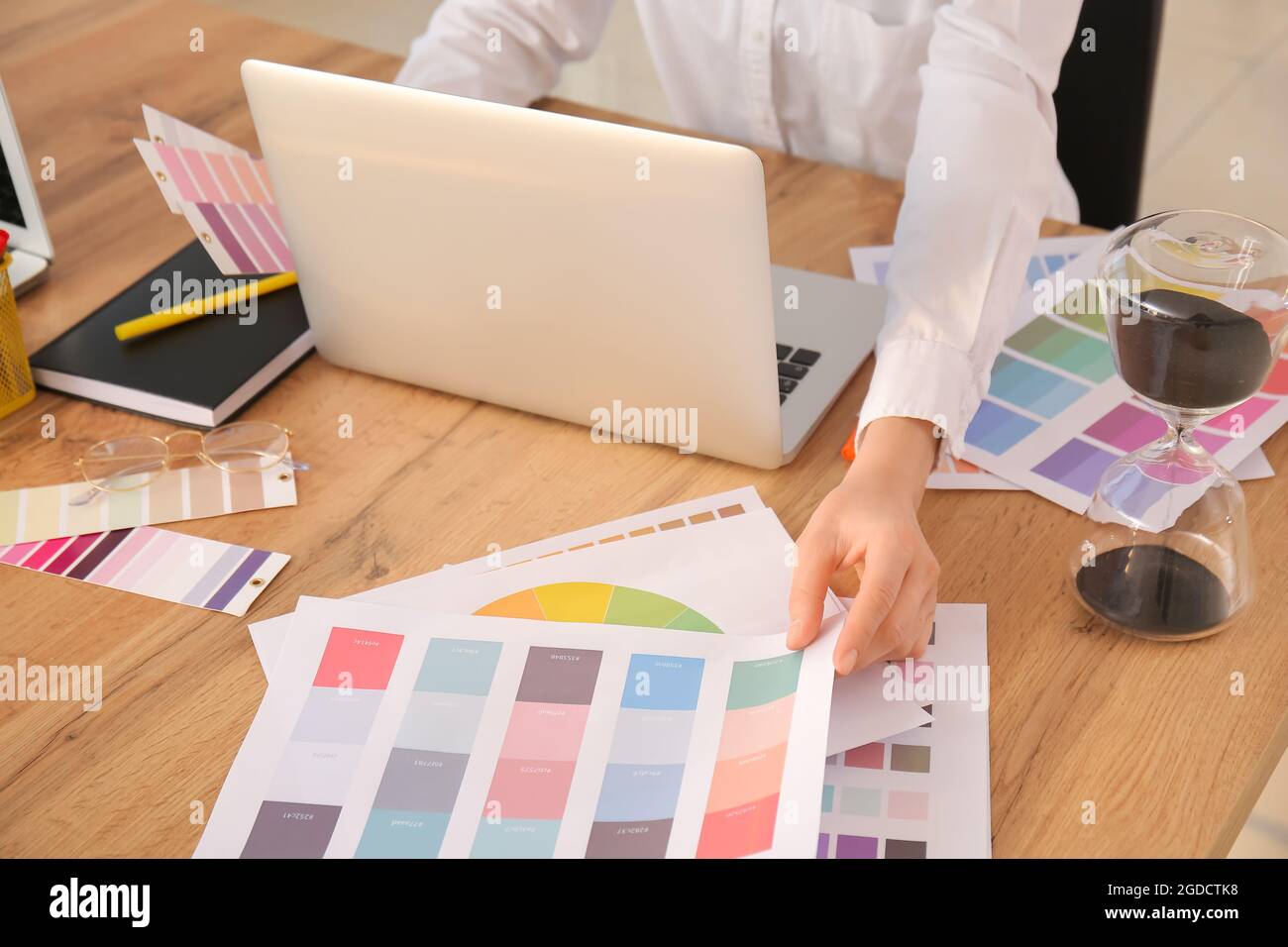 Graphic designer working in office Stock Photo - Alamy