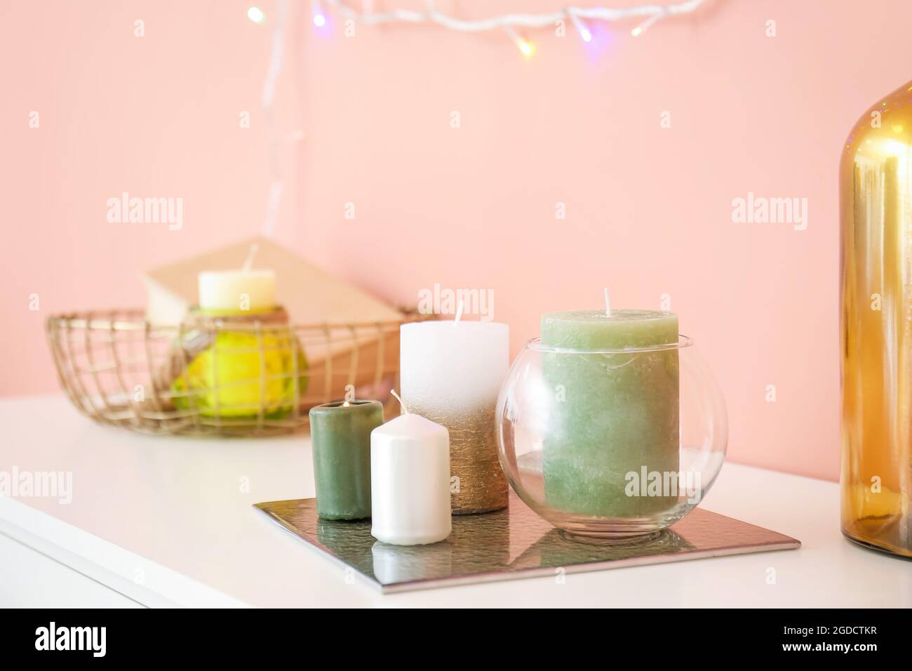 Aroma candles on table in room Stock Photo - Alamy