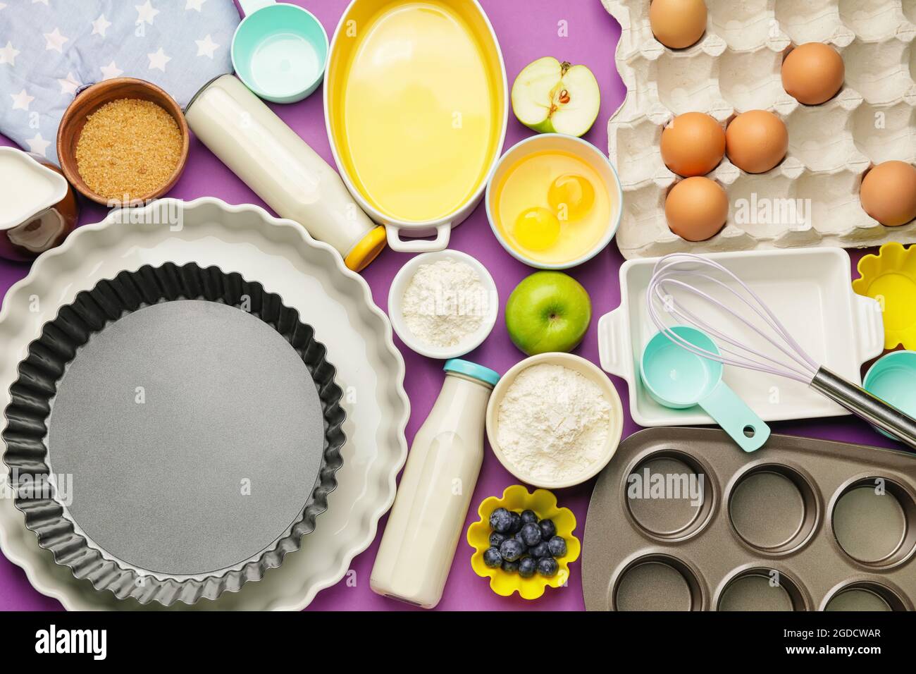Ingredients for preparing bakery and kitchen utensils on color ...