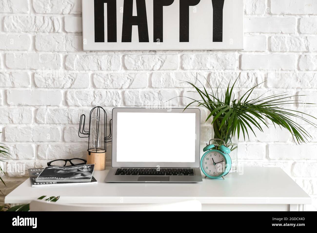 Modern stylish workplace with laptop Stock Photo - Alamy