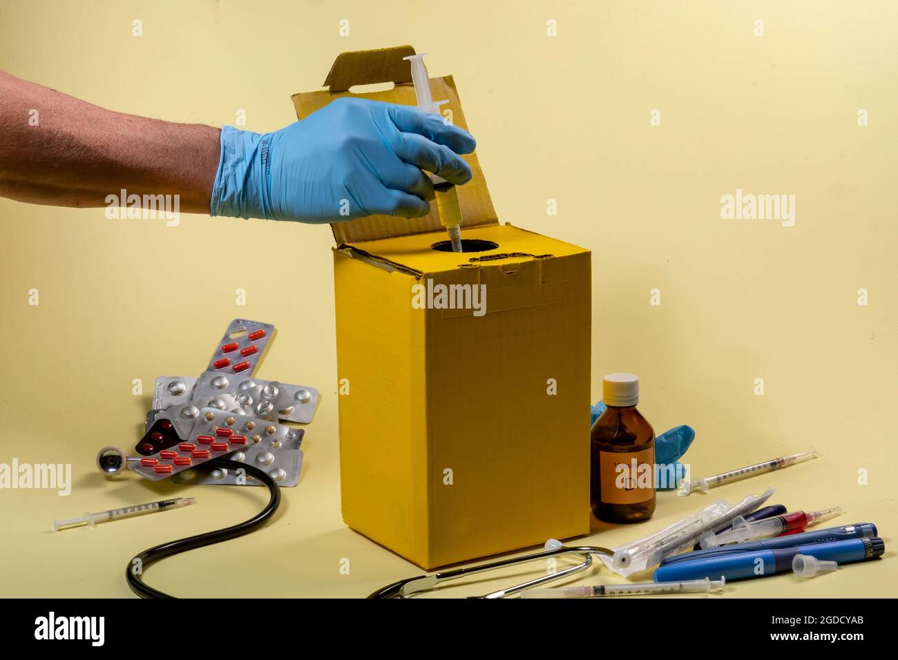 Syringe disposal box hi-res stock photography and images - Alamy
