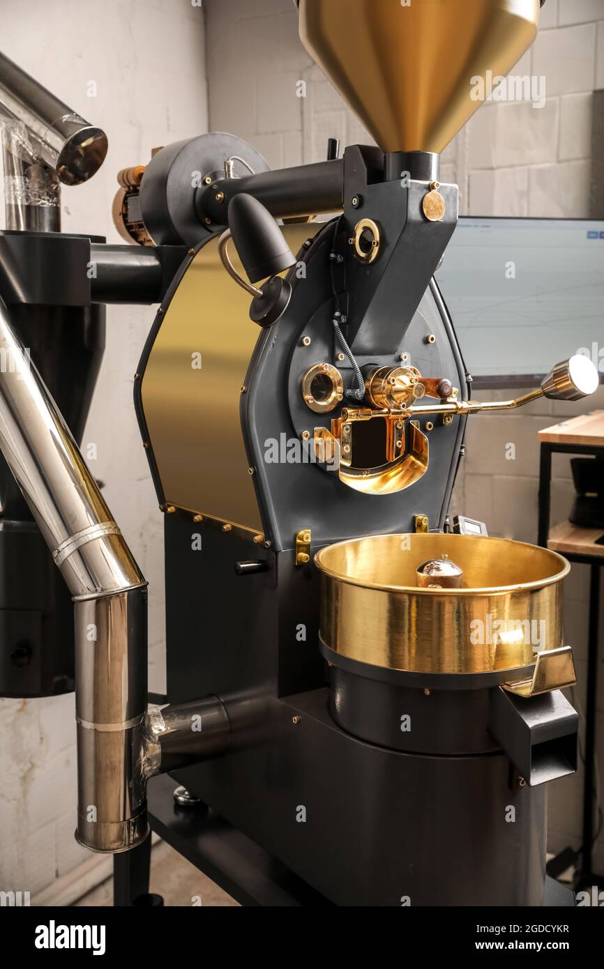 Modern roaster for coffee beans indoors Stock Photo - Alamy