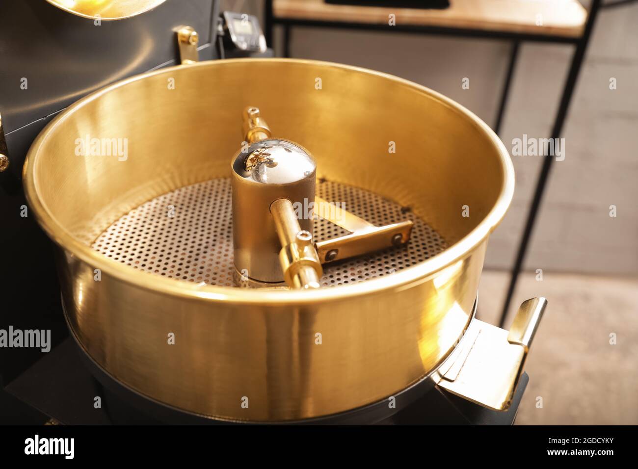 Modern coffee roaster cooling tray, closeup view Stock Photo - Alamy