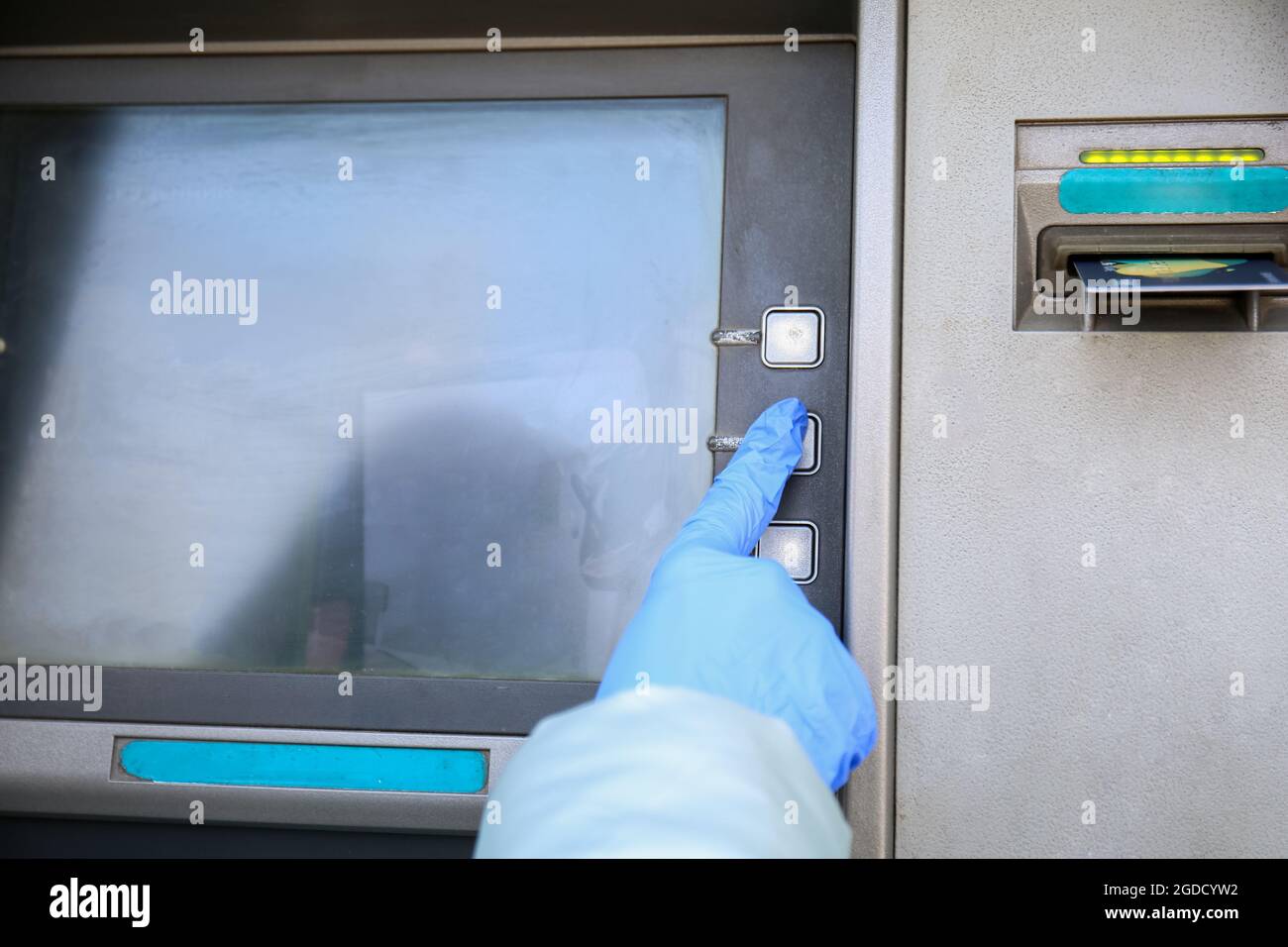 Woman withdrawing money from ATM, closeup Stock Photo - Alamy