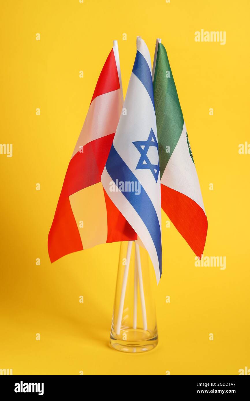 Flags of different countries on color background Stock Photo - Alamy