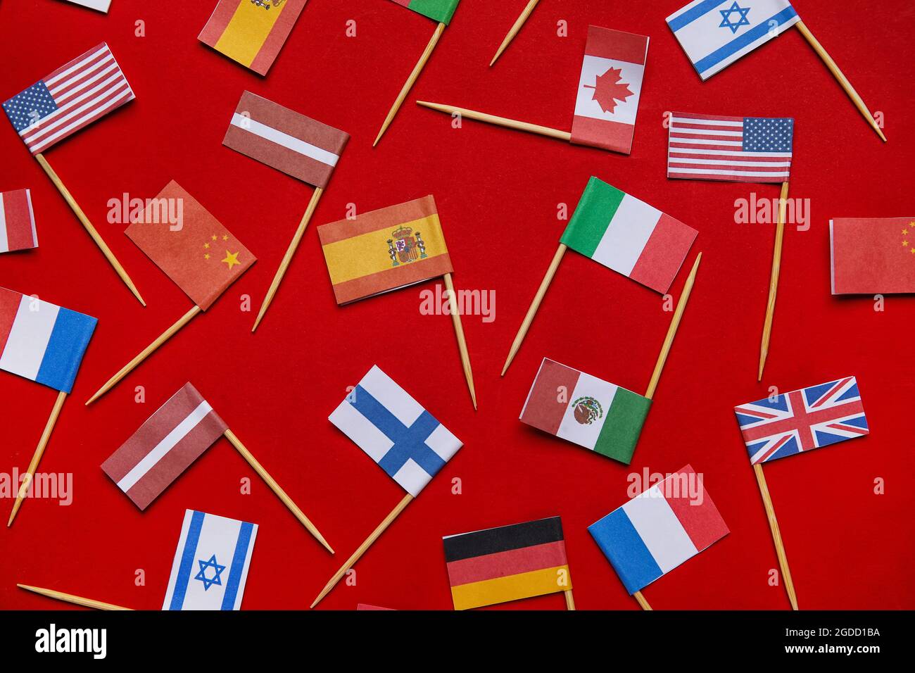Flags of different countries on color background Stock Photo - Alamy