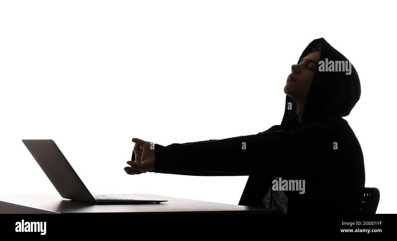 Silhouette of hacker with laptop on white background Stock Photo - Alamy
