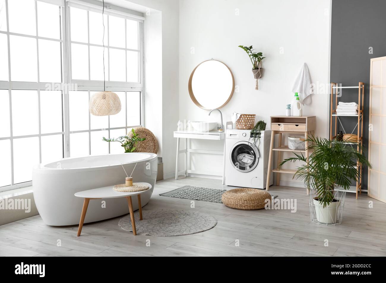 Interior of bathroom with modern washing machine Stock Photo - Alamy