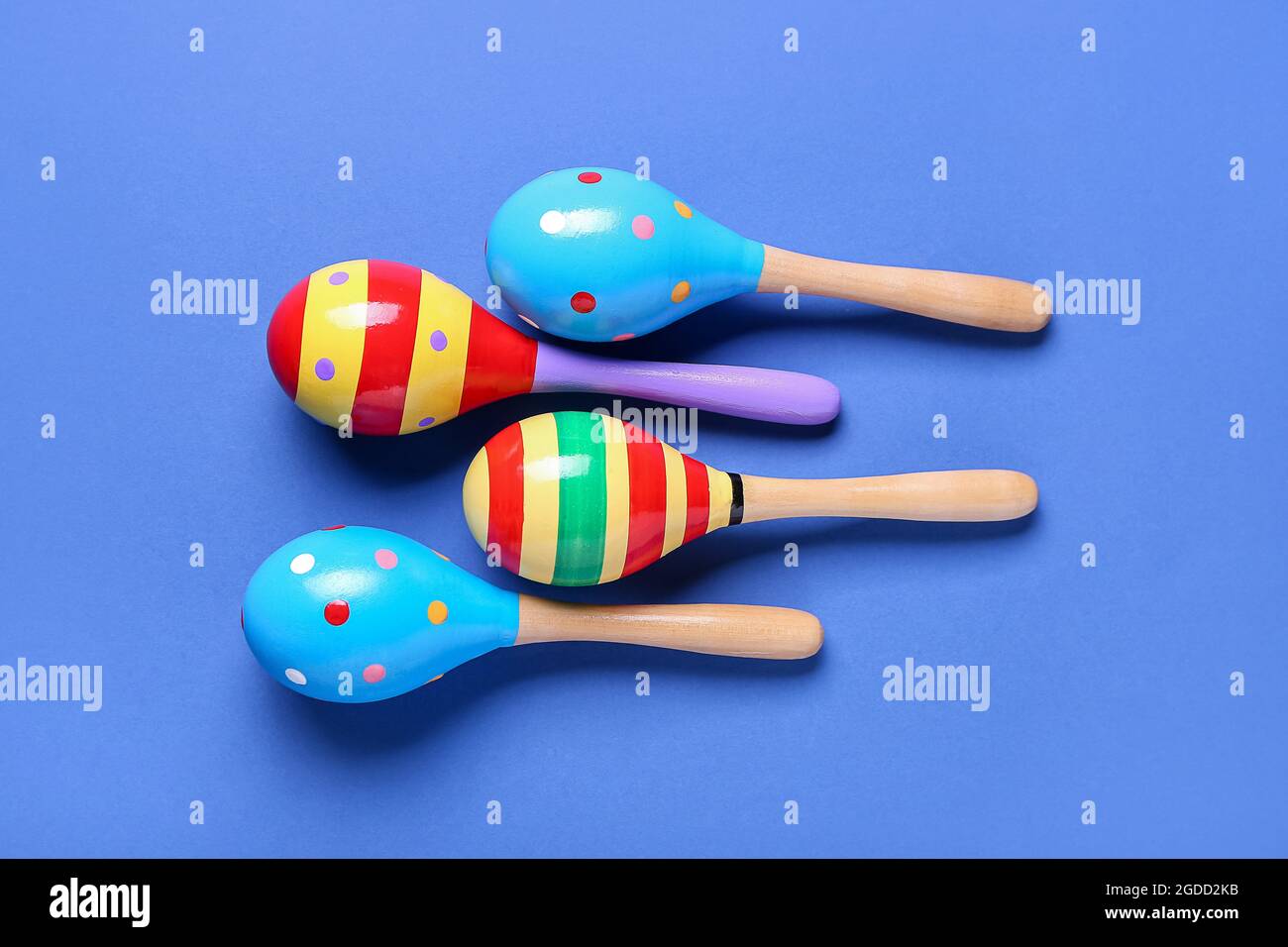 Mexican maracas on color background Stock Photo - Alamy