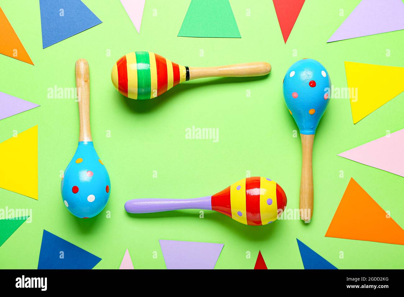 Frame made of Mexican maracas on color background Stock Photo - Alamy