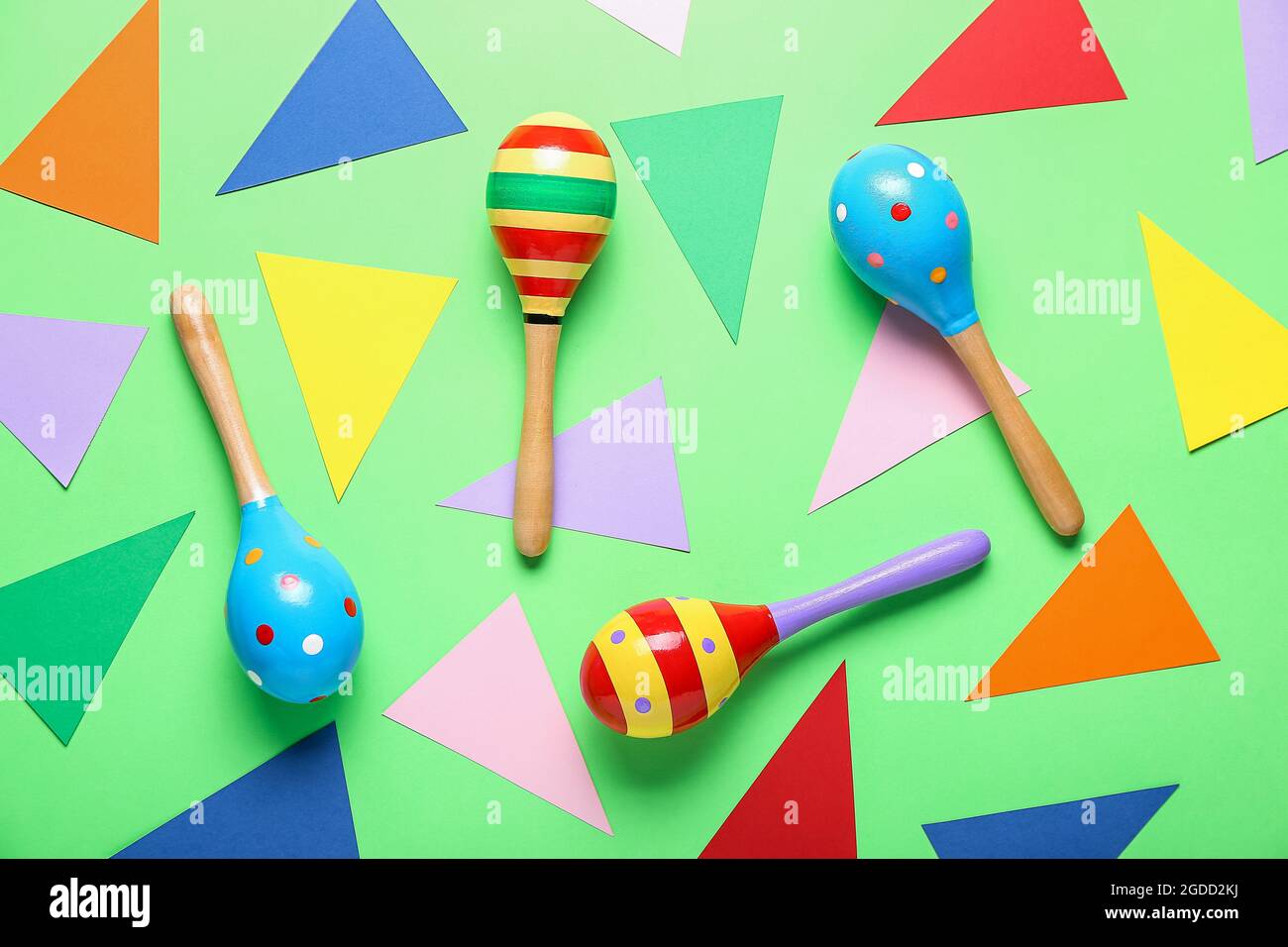 Mexican maracas and decor on color background Stock Photo - Alamy