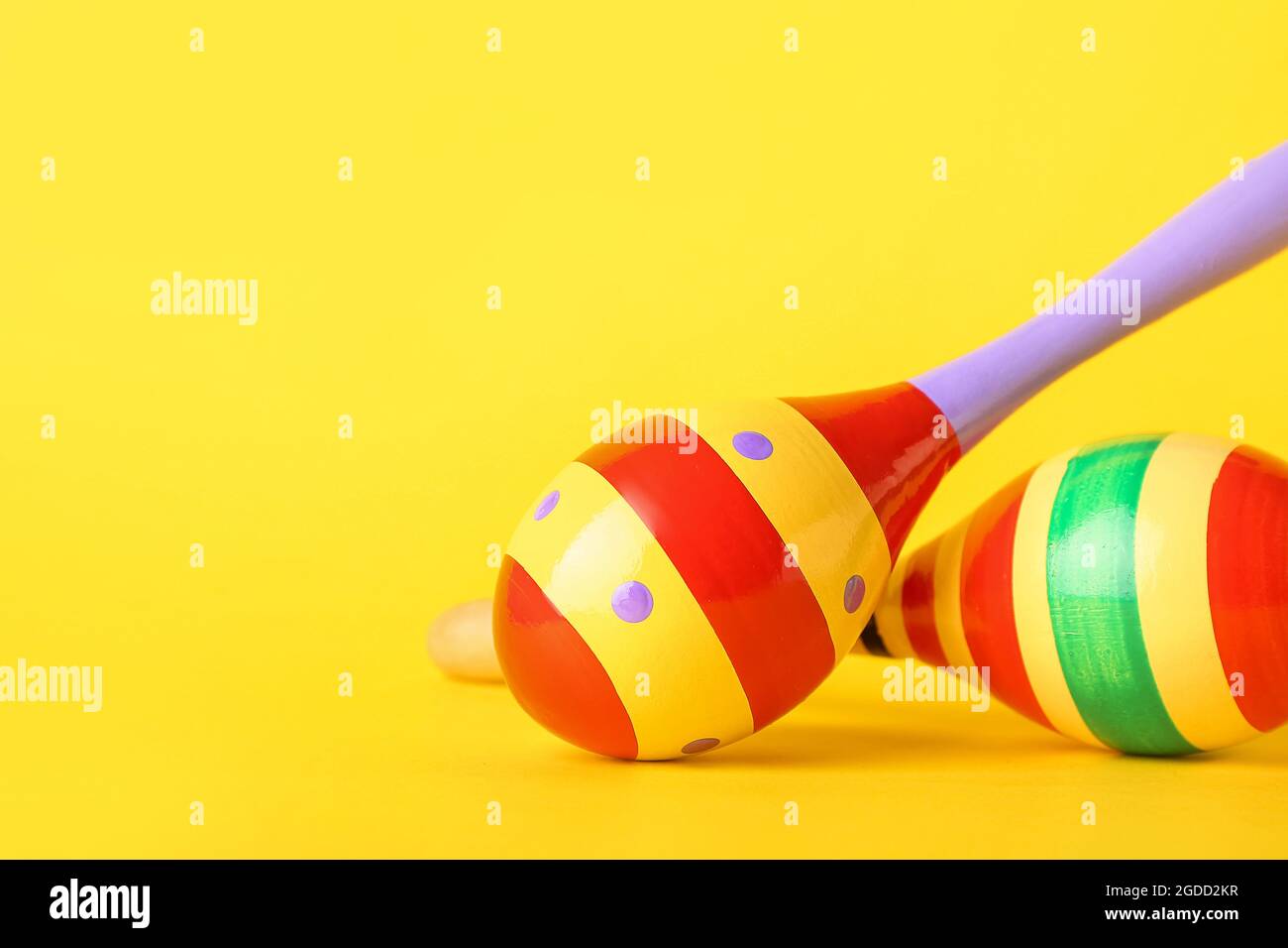 Mexican maracas on color background Stock Photo - Alamy