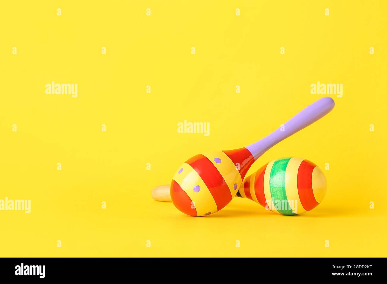 Mexican maracas on color background Stock Photo - Alamy