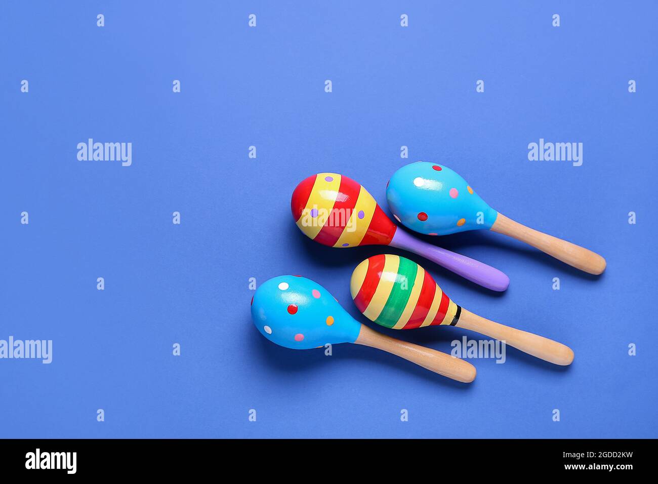 Mexican maracas on color background Stock Photo - Alamy