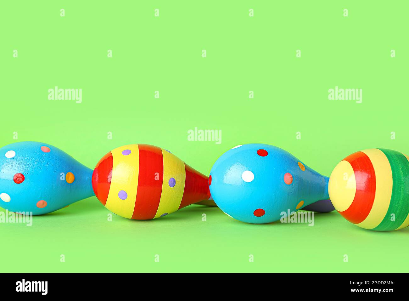 Mexican maracas on color background Stock Photo - Alamy