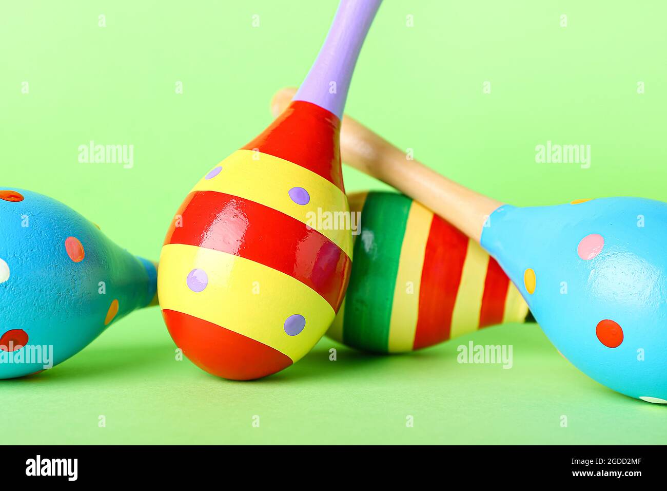 Mexican maracas on color background Stock Photo - Alamy