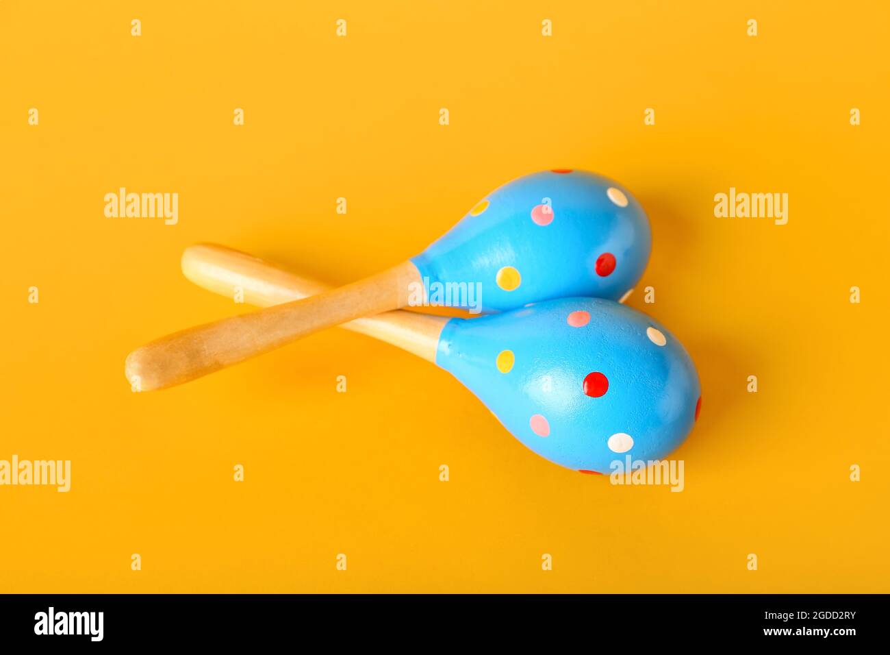 Mexican maracas on color background Stock Photo - Alamy