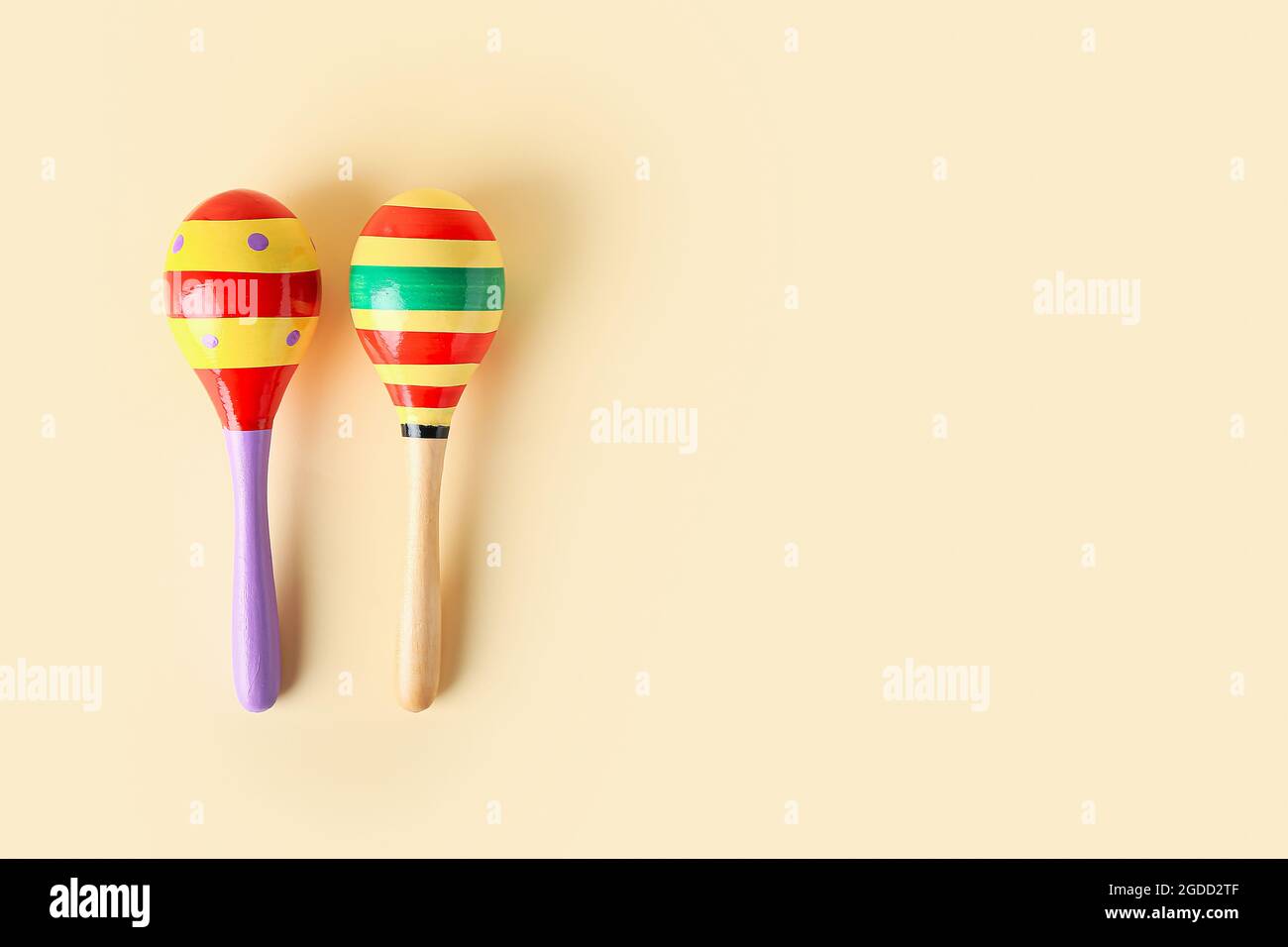 Mexican maracas on color background Stock Photo - Alamy