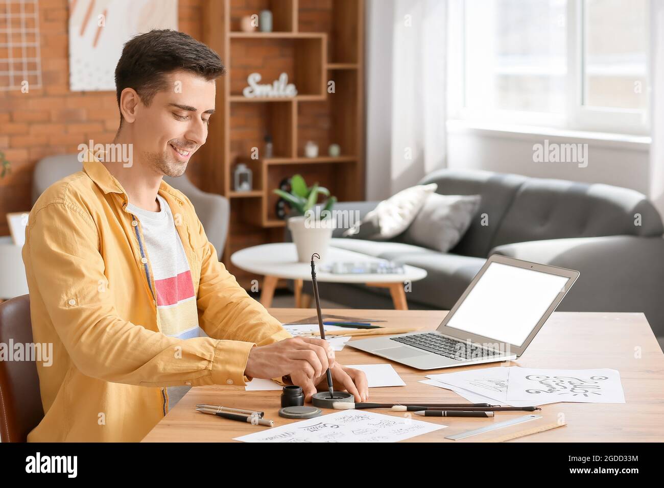 Calligrapher paints hi-res stock photography and images - Alamy