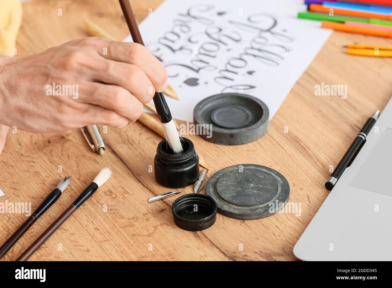 Calligrapher paints hi-res stock photography and images - Alamy