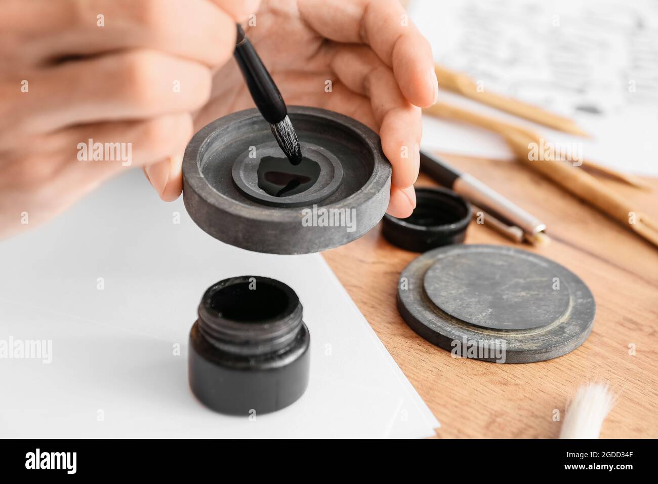 Calligrapher paints hi-res stock photography and images - Alamy