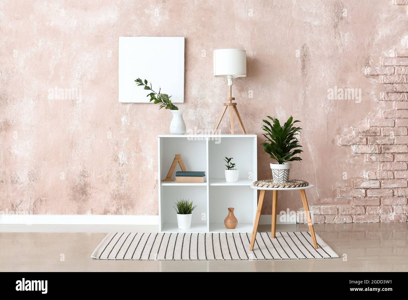 Interior of stylish room with chest of drawers Stock Photo - Alamy