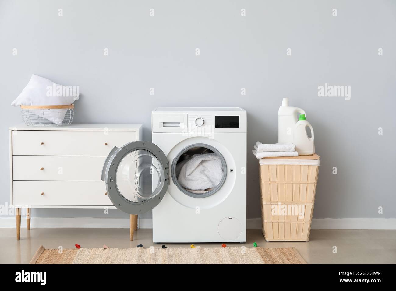 Interior of bathroom with modern washing machine Stock Photo - Alamy