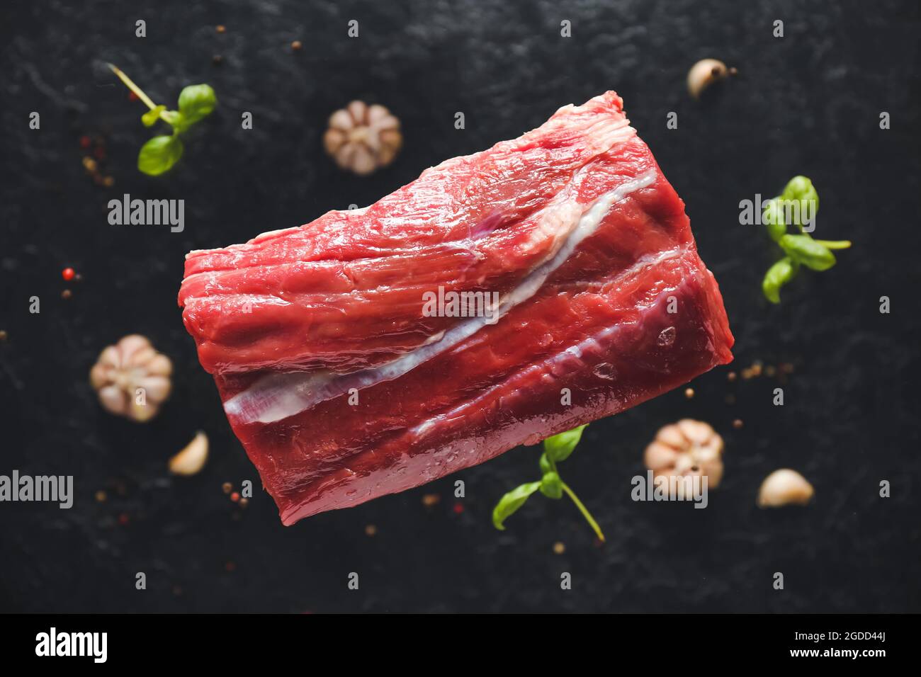 Flying raw beef steaks hi-res stock photography and images - Alamy