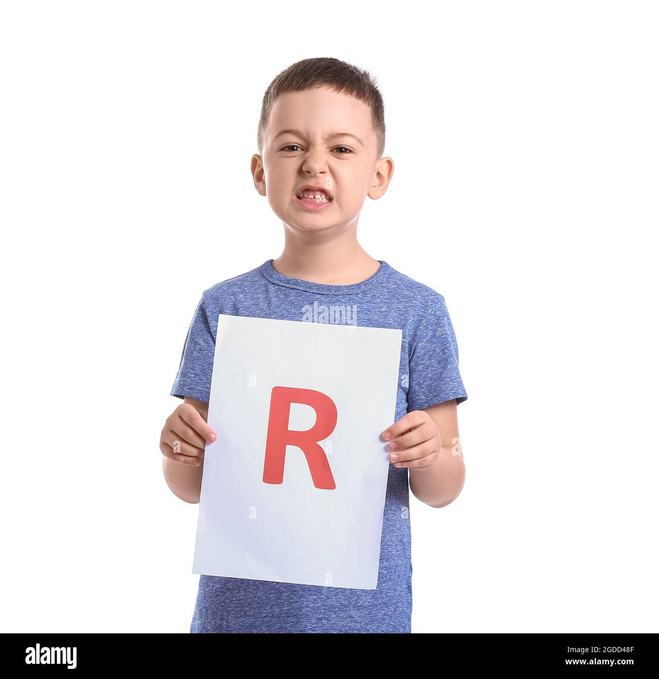 Little boy holding paper sheet with letter R on white background Stock ...
