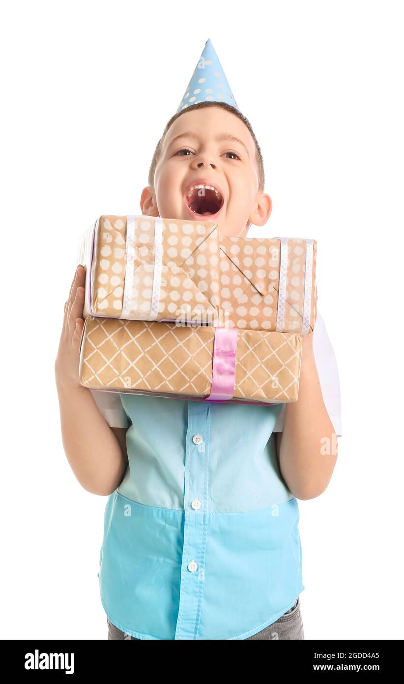 Surprised little boy with presents on white background Stock Photo - Alamy