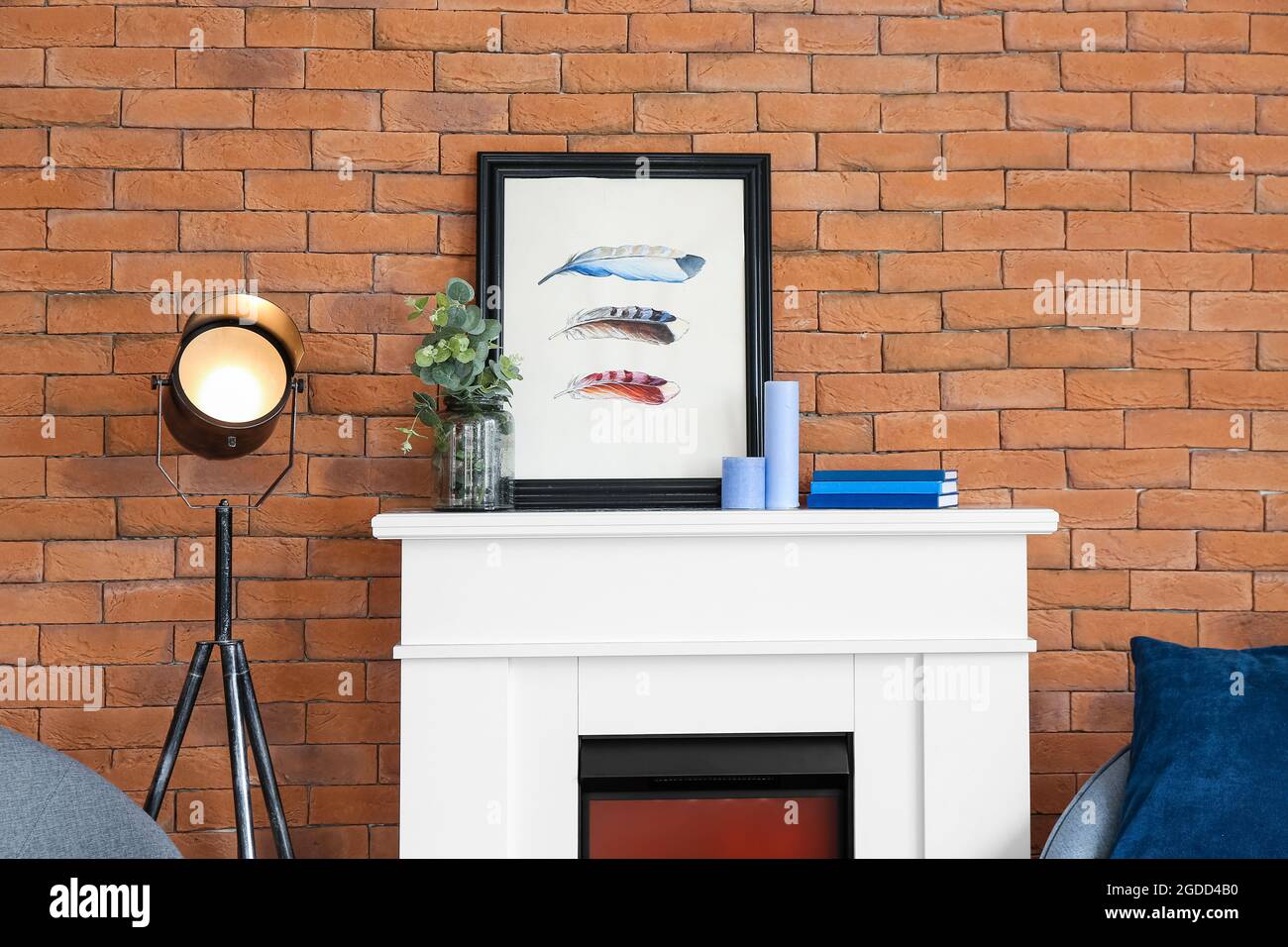 Modern fireplace in interior of stylish living room Stock Photo - Alamy